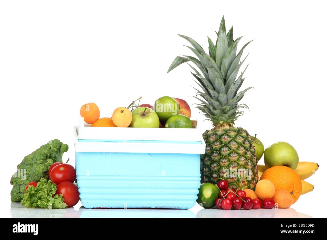 Fresh fruits and vegetables in mini refrigerator, isolated on white ...