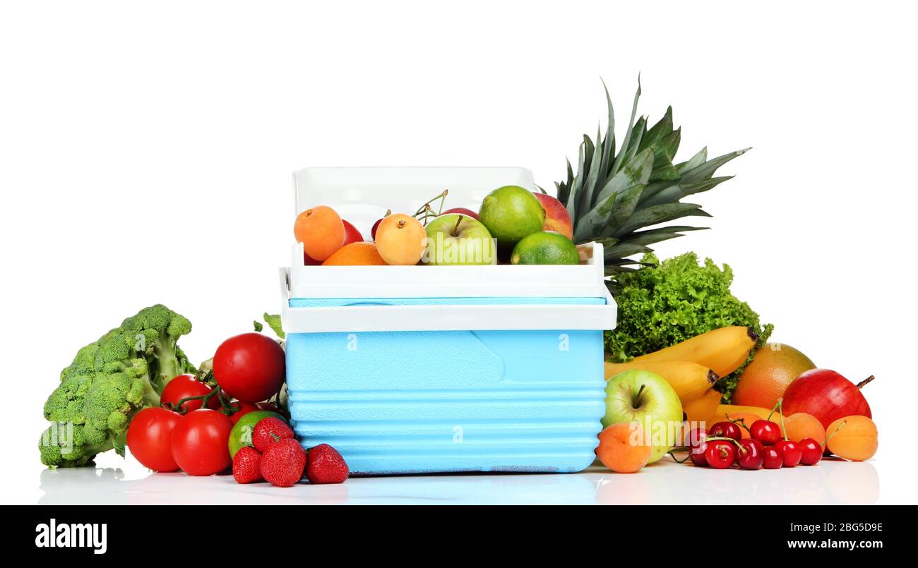 Fresh fruits and vegetables in mini refrigerator, isolated on white ...