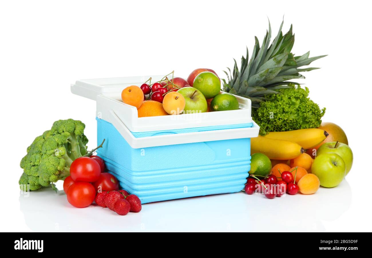 Fresh fruits and vegetables in mini refrigerator, isolated on white ...