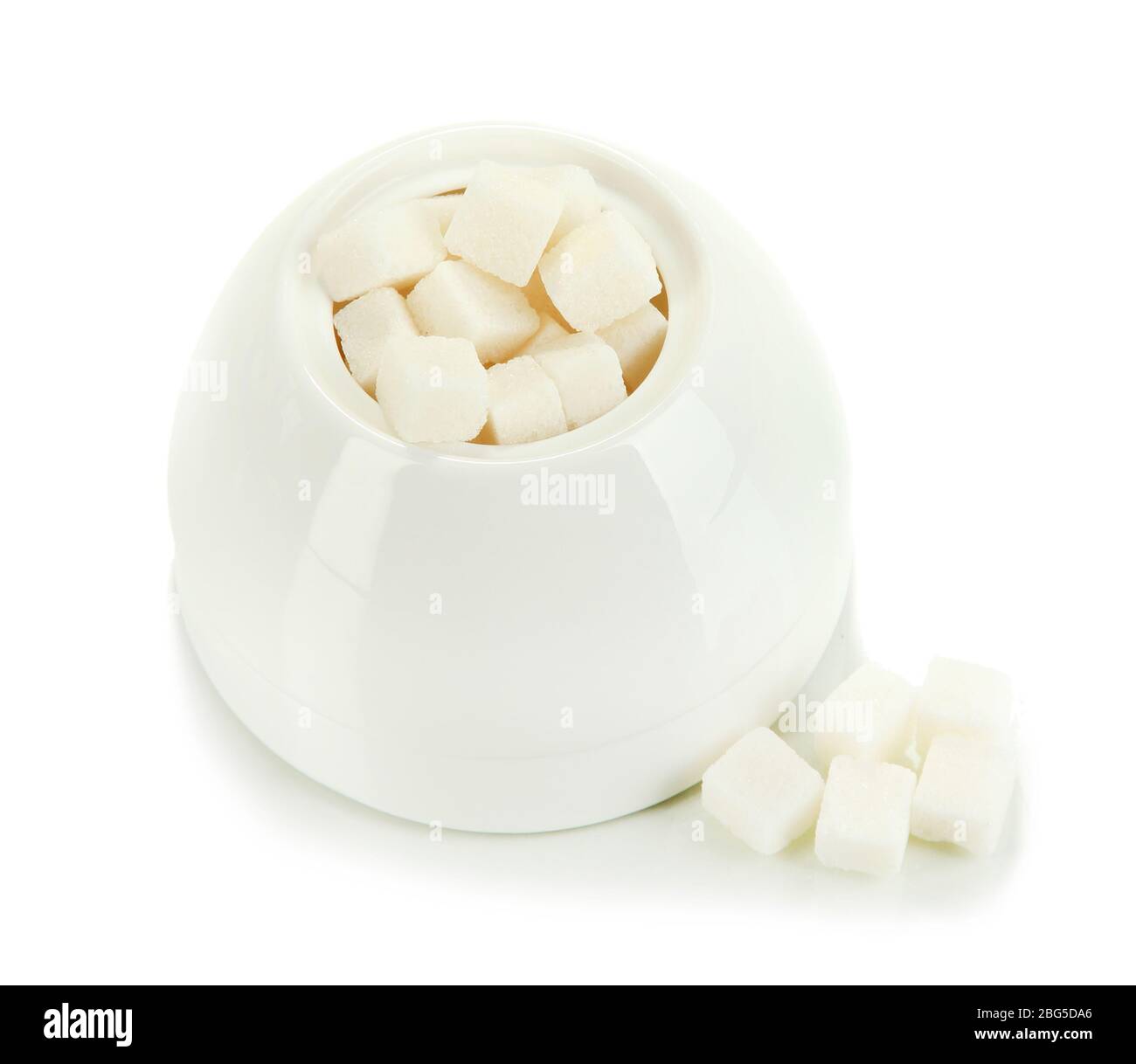 Refined sugar in white sugar bowl on grey background Stock Photo - Alamy