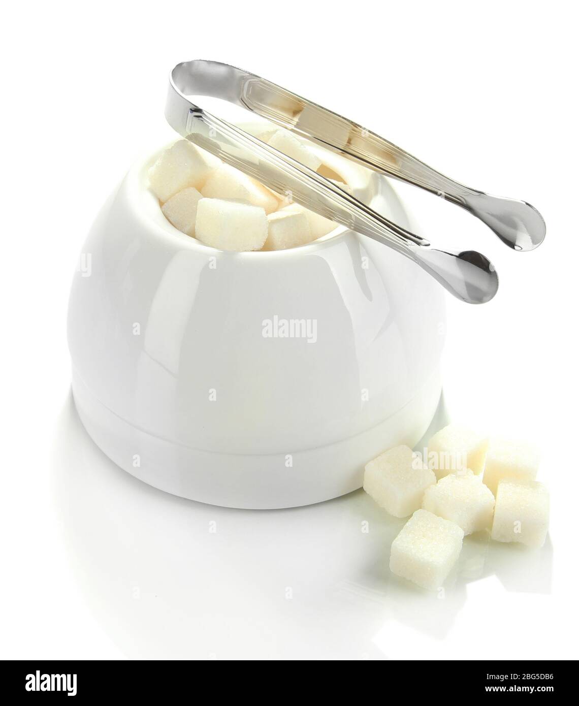 Refined sugar in white sugar bowl on grey background Stock Photo - Alamy