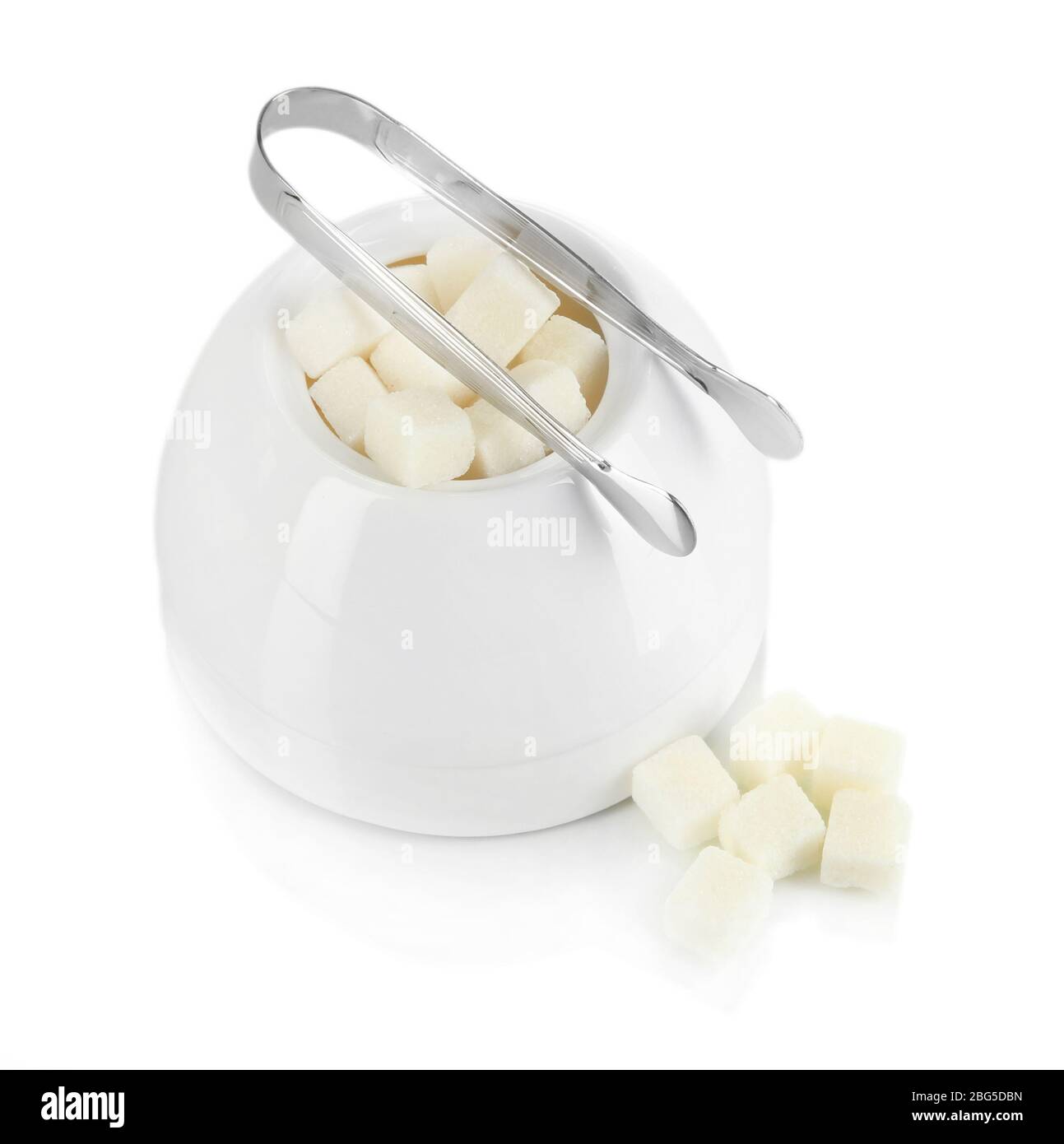 Refined sugar in white sugar bowl on grey background Stock Photo - Alamy