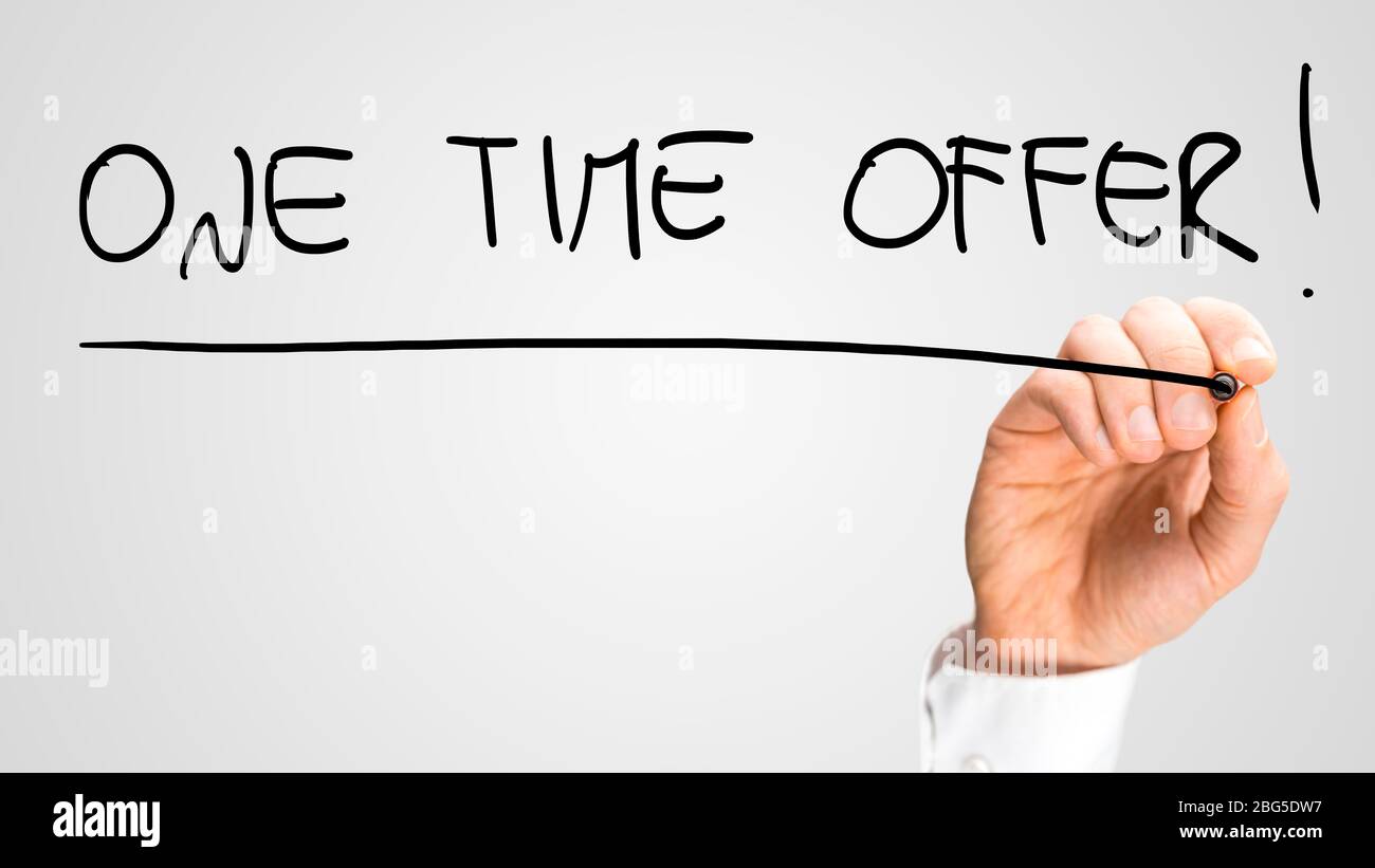 Male hand writing commercial sign One time offer on virtual screen ...