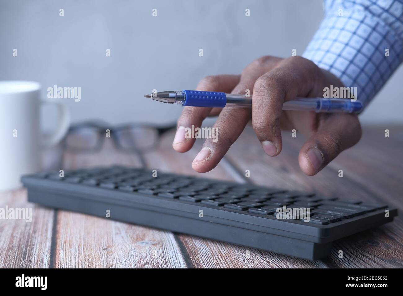 Close up of person hand typing keyboard Stock Photo - Alamy