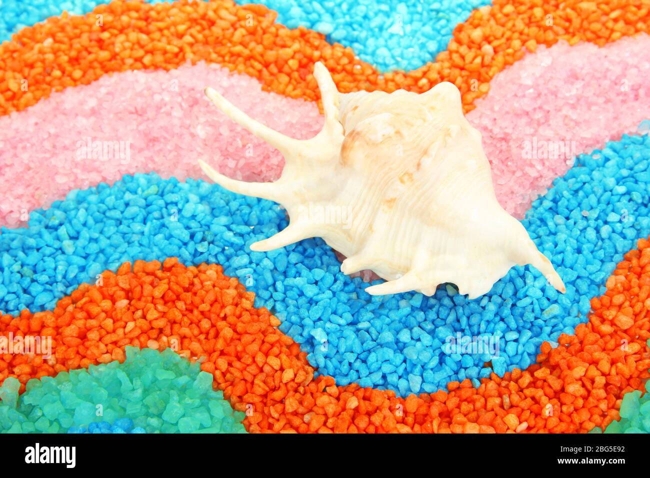 Shell on colorful crystals of sea salt background Stock Photo - Alamy