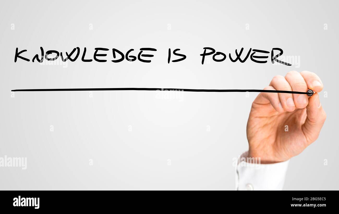 Male hand underlining sign Knowledge is power on virtual screen Stock ...