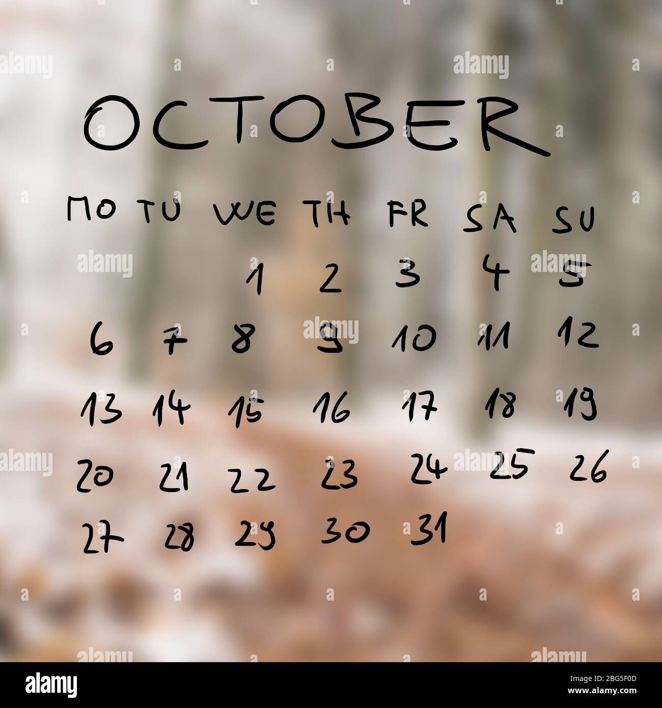 Handwritten calendar for the month of October on a muted blurred ...