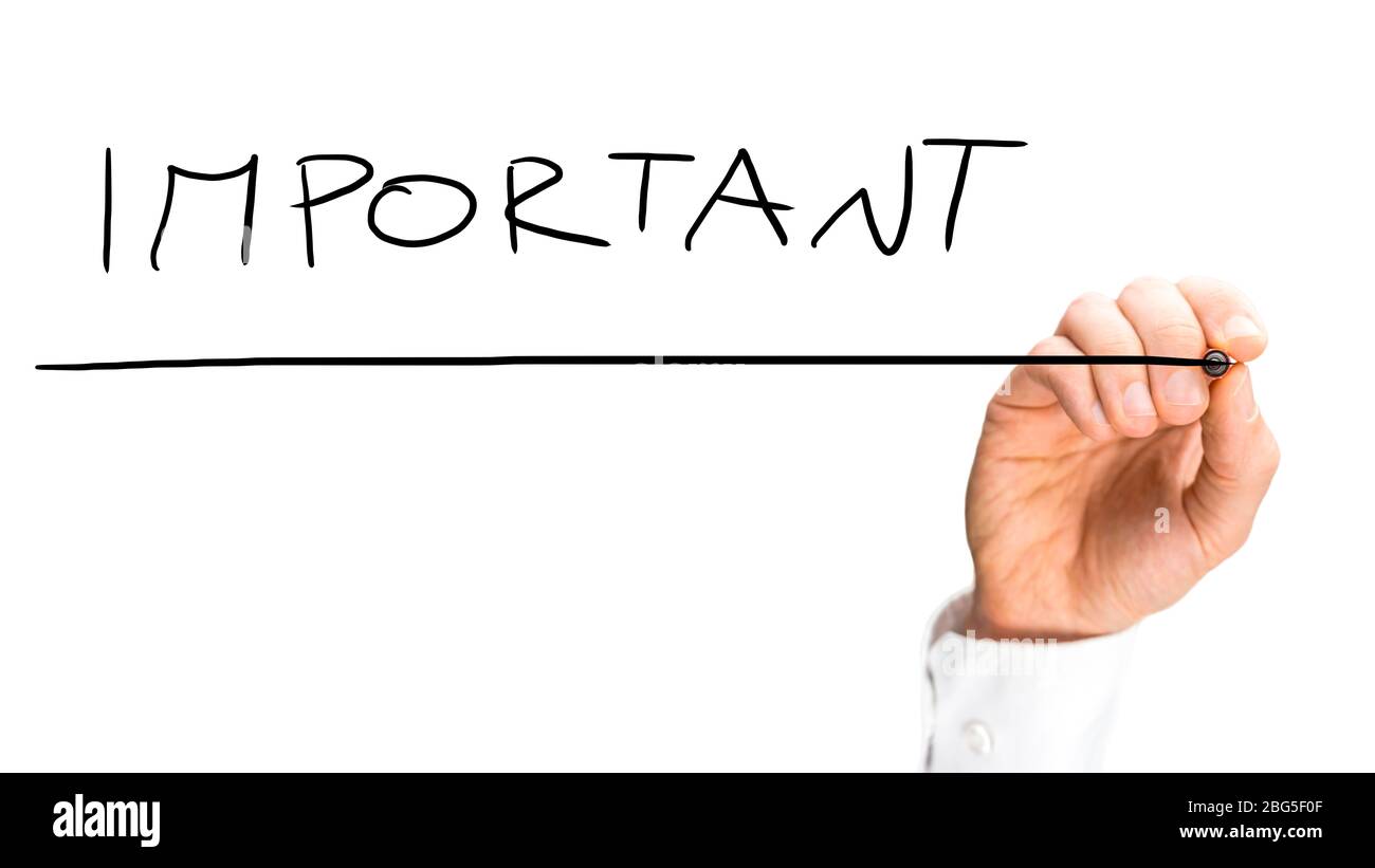 Man writing a handwritten message - Important - with a black marker on ...