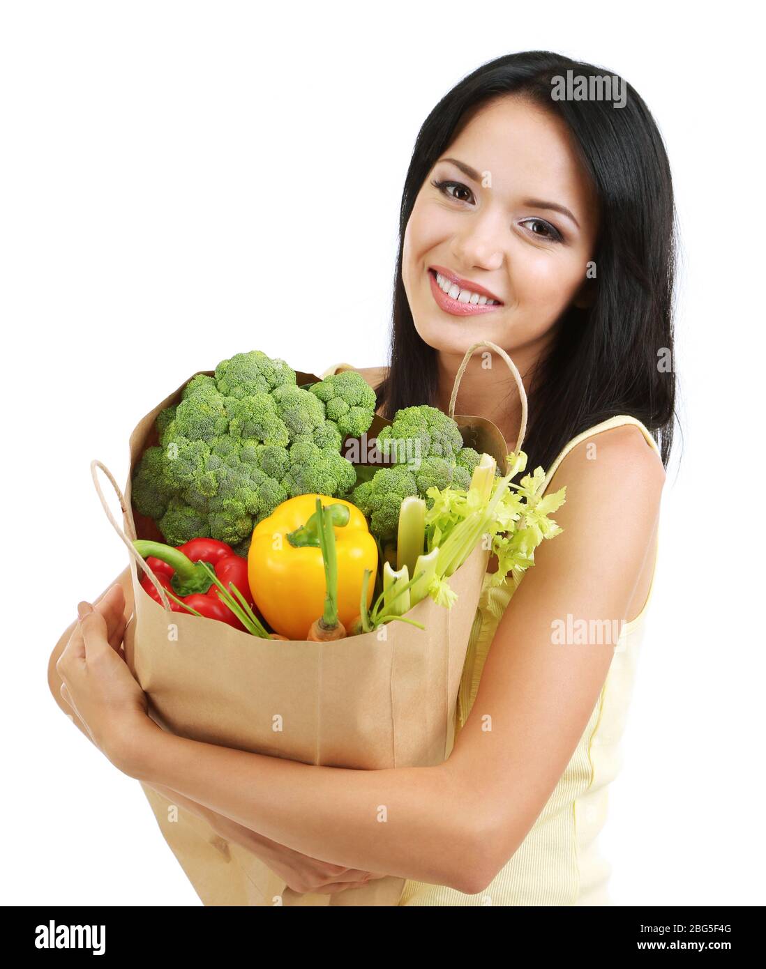 Girl with package of food isolated on white Stock Photo - Alamy