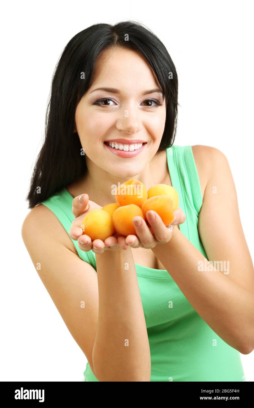 Girl with fresh apricots isolated on white Stock Photo - Alamy
