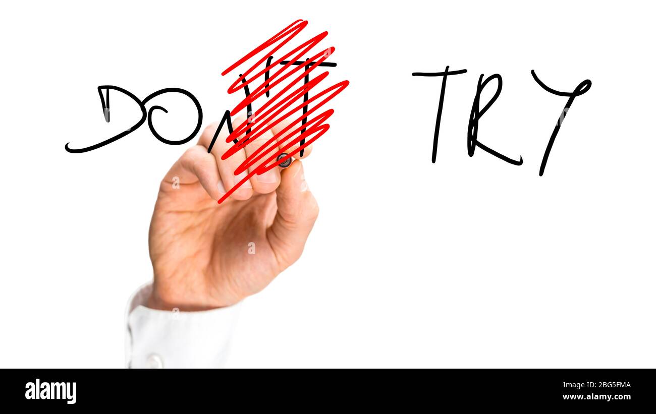 Male hand changing sign don't try into Do try on virtual screen Stock ...