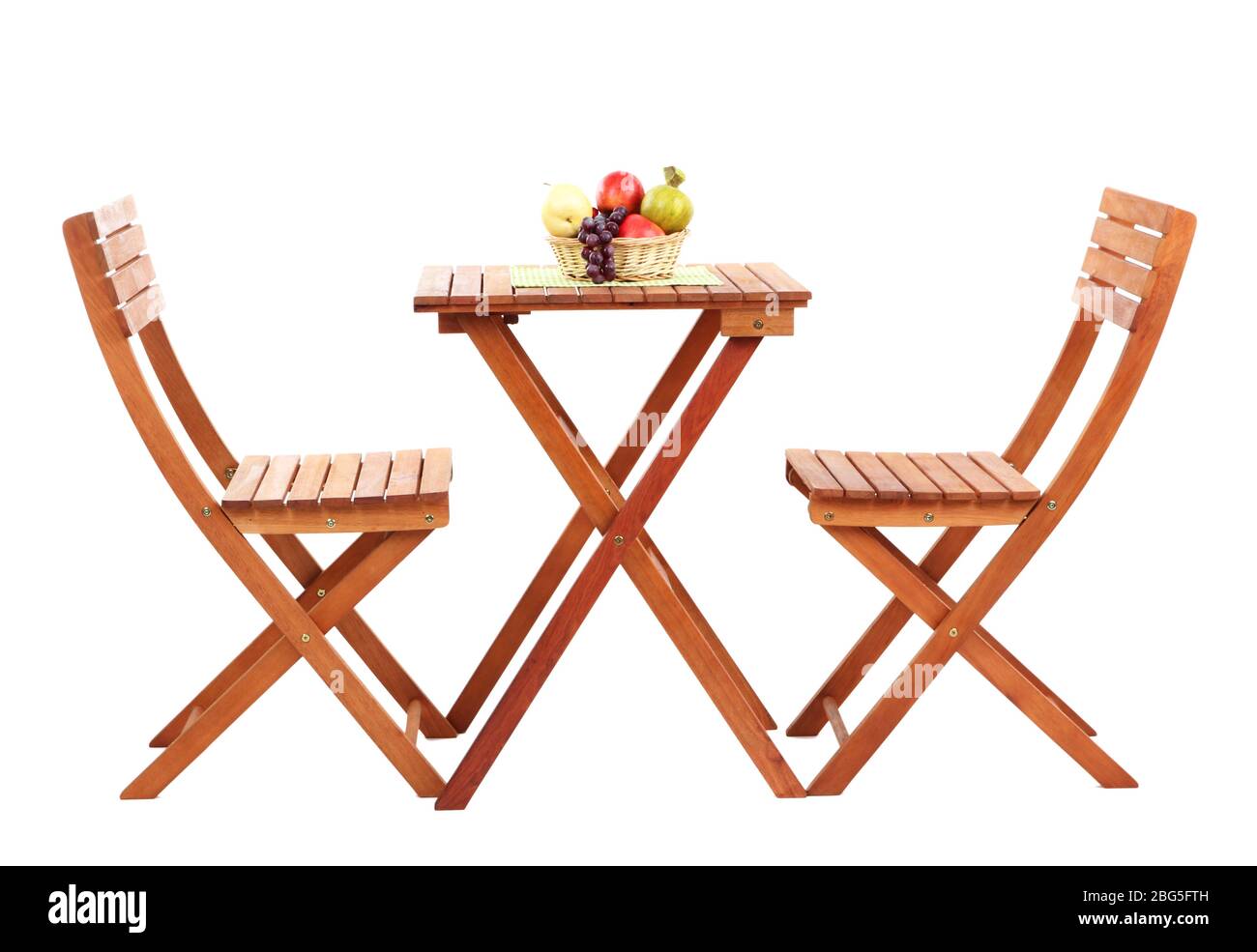 Wooden table with fruit isolated on white Stock Photo - Alamy