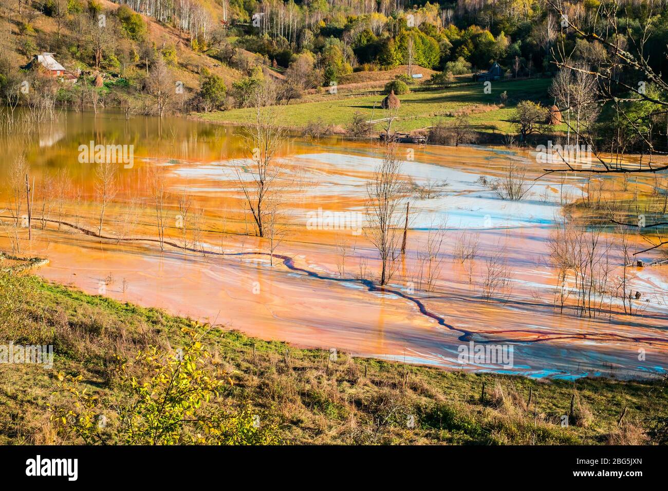 Lake with toxic waste water, mining chemical residuals, mud. Ecological ...