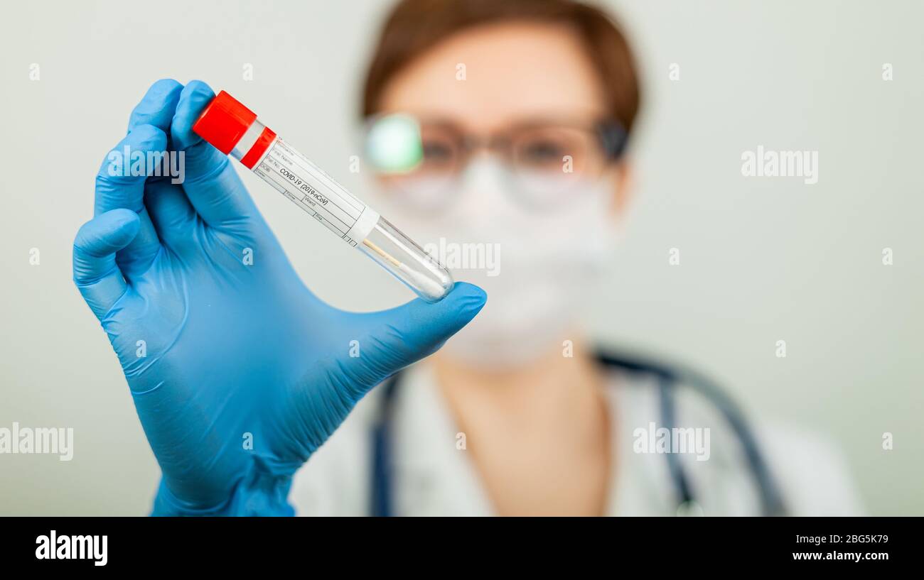 Test for coronavirus Covid-19. Female doctor or nurse doing lab ...