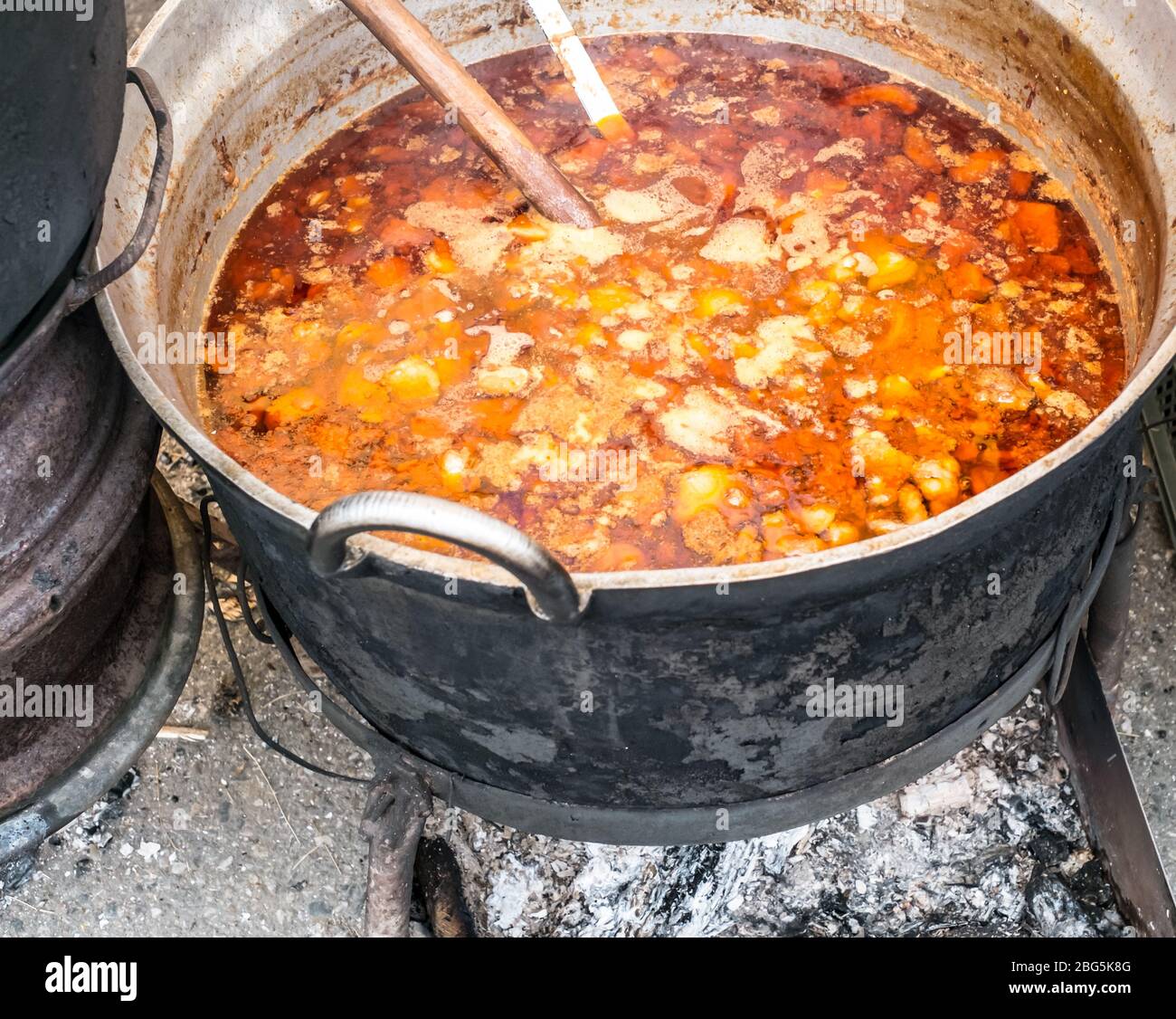 Romanian traditional food prepared at the cauldron on the open fire ...