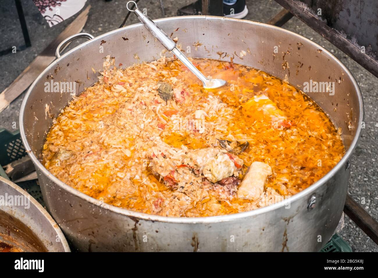 Romanian traditional food prepared at the cauldron on the open fire ...