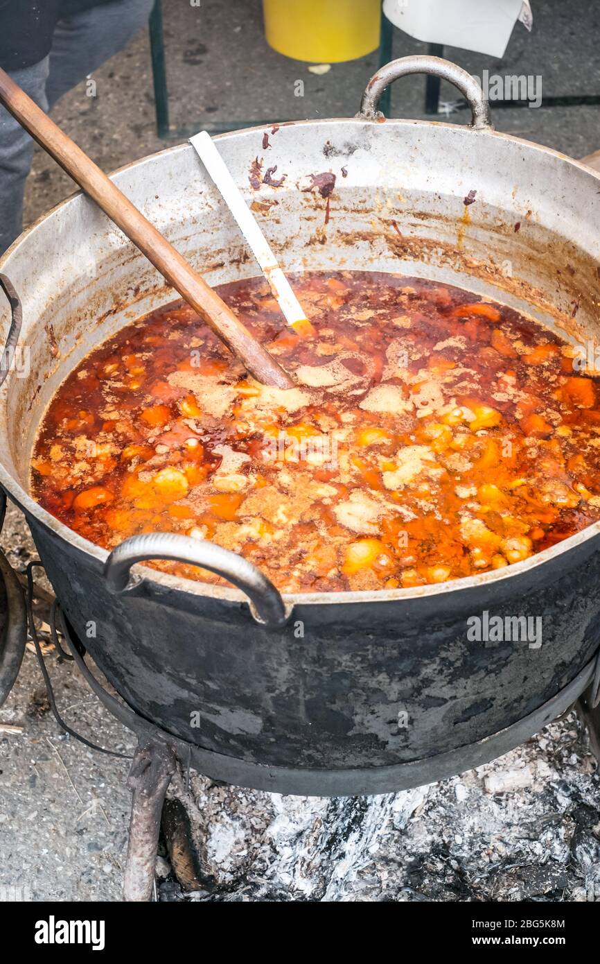 Romanian traditional food prepared at the cauldron on the open fire ...