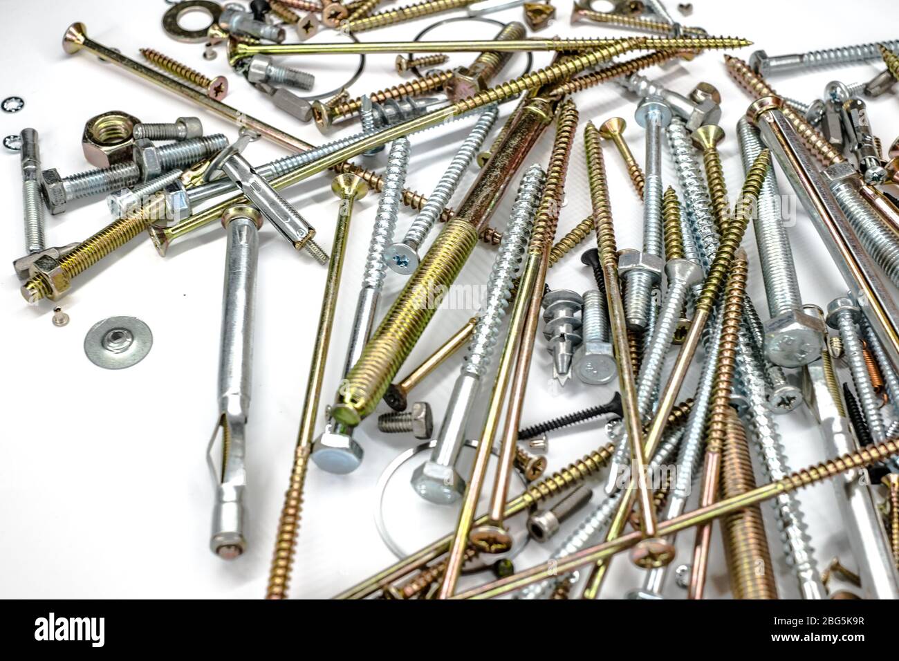 pile of Screws and washers on white background Stock Photo - Alamy