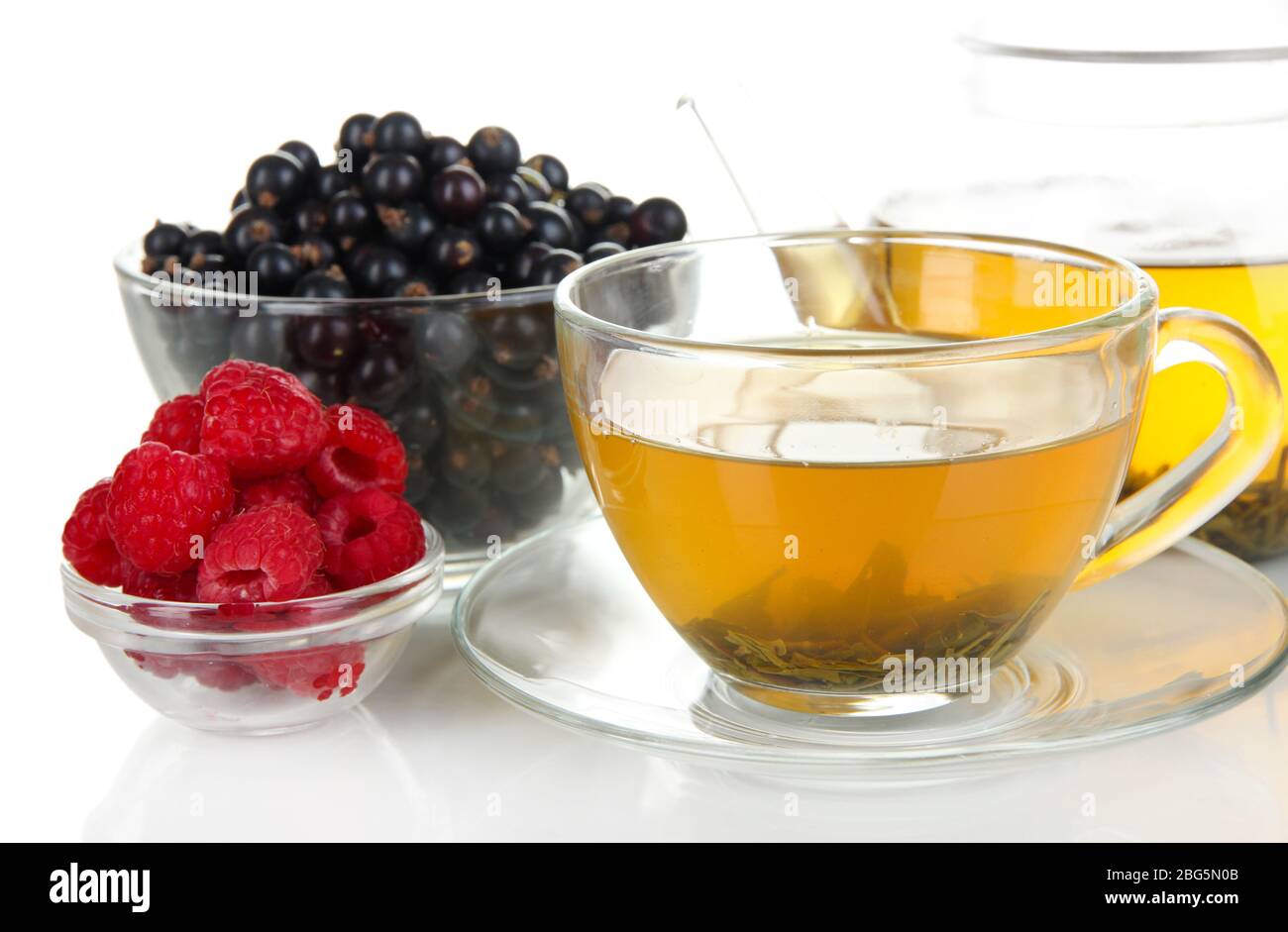 Cup of berry tea isolated on white Stock Photo - Alamy