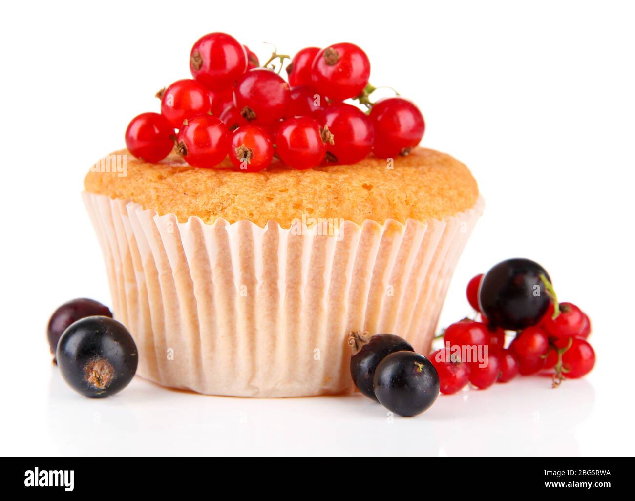 Tasty muffin with berries isolated on white Stock Photo - Alamy