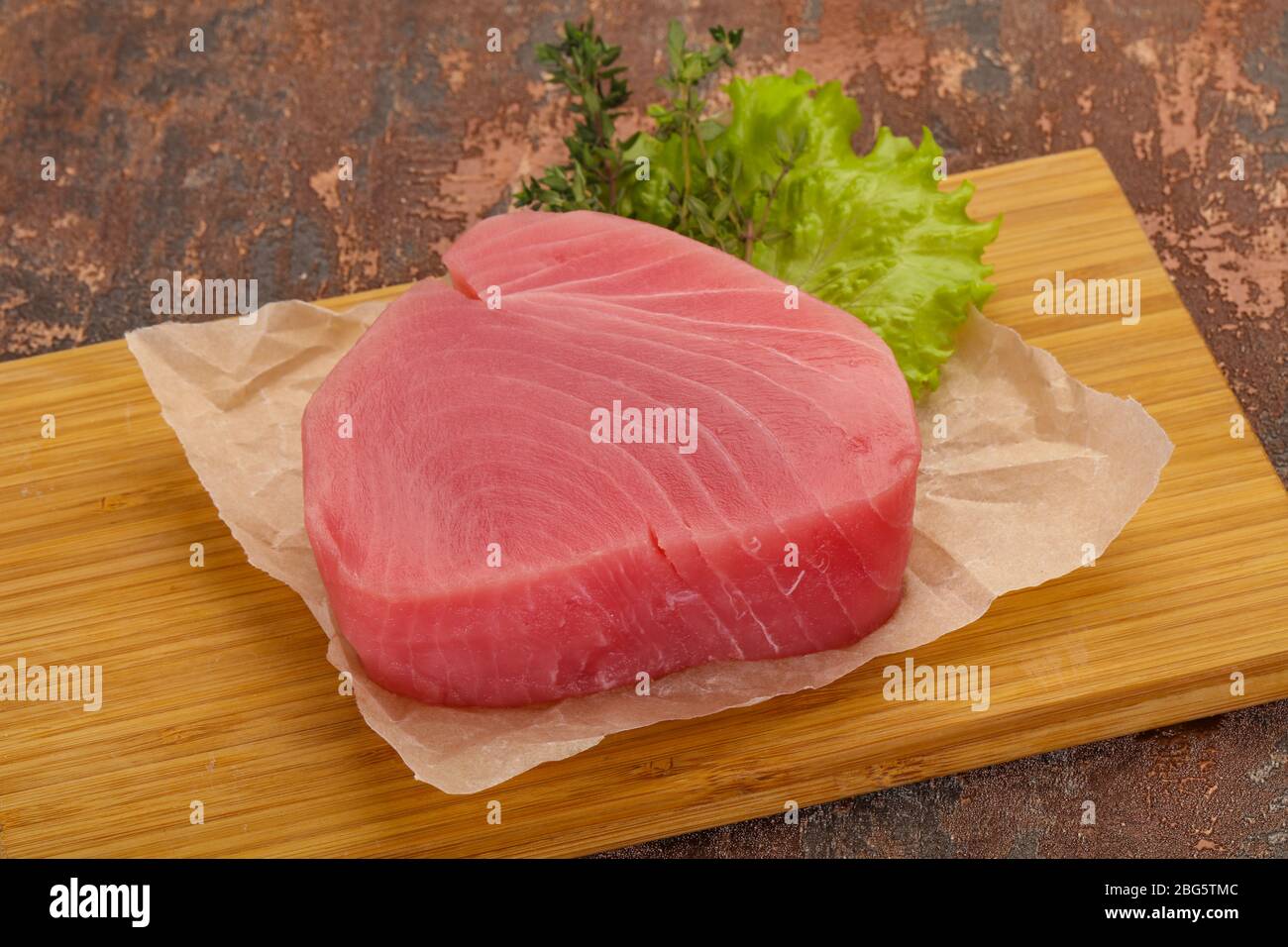 Raw tuna steak ready for cooking Stock Photo - Alamy