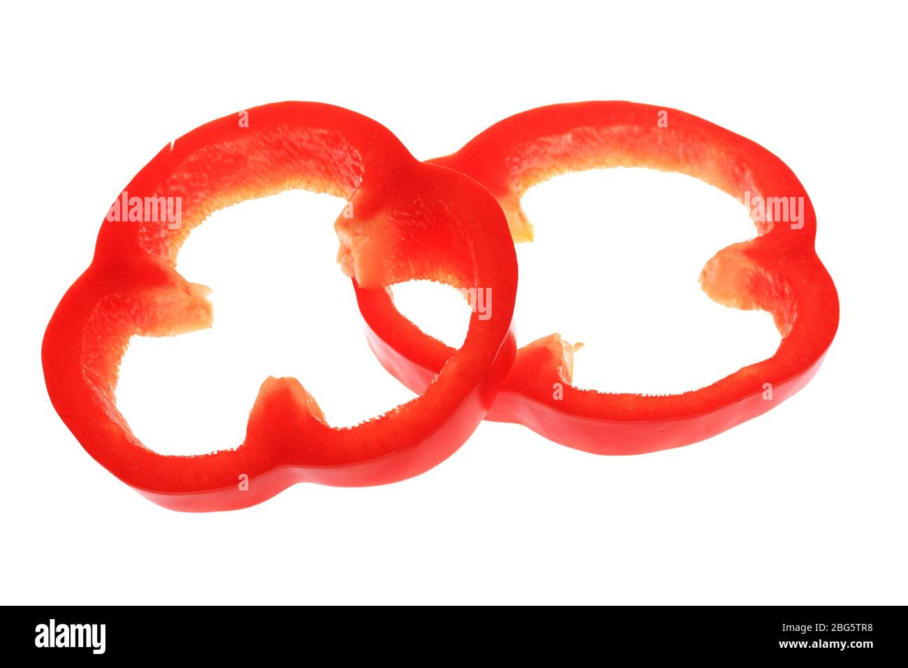 Fresh red pepper slices isolated on white Stock Photo - Alamy
