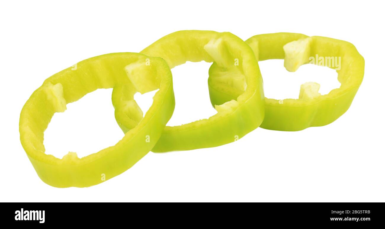 Fresh green pepper slices isolated on white Stock Photo - Alamy