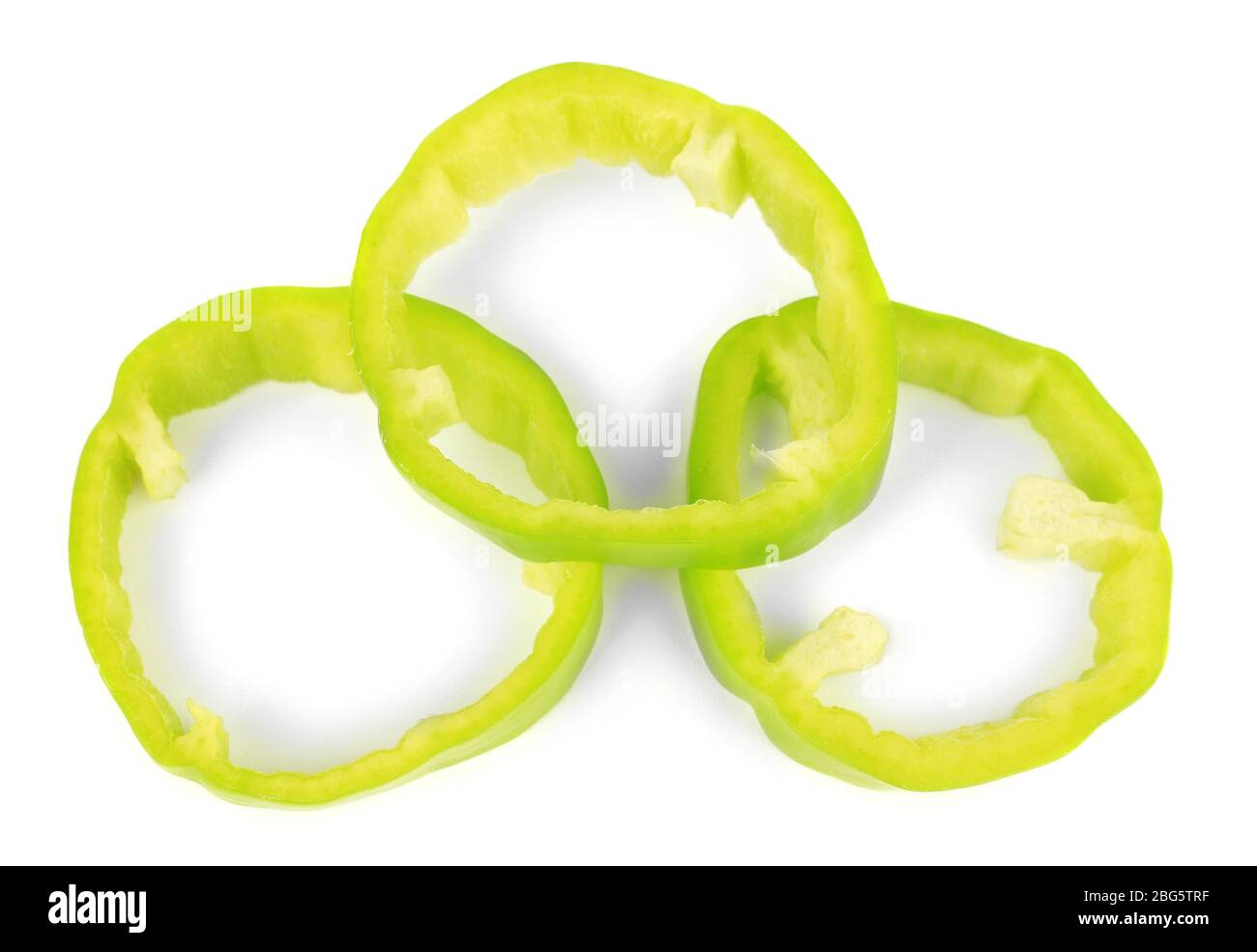 Fresh green pepper slices isolated on white Stock Photo - Alamy