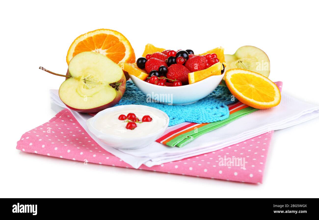 Useful fruit salad of fresh fruits and berries in bowl isolated on ...