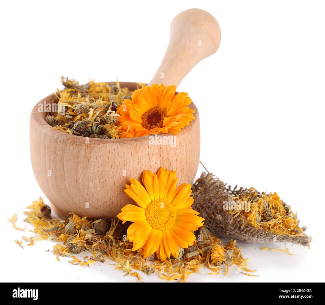 Fresh and dried calendula flowers in wooden mortar isolated on white ...