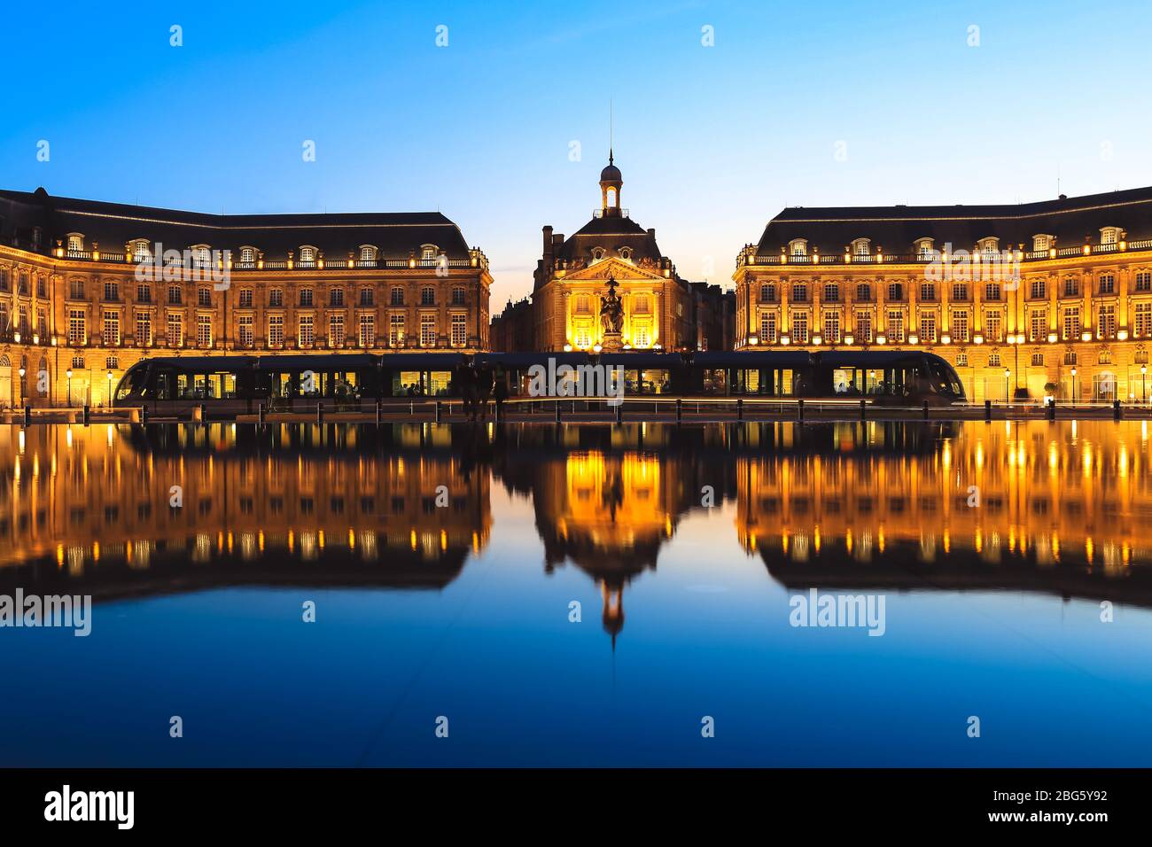 Reflection of Place De La Bourse and tram in Bordeaux, France. A Unesco ...