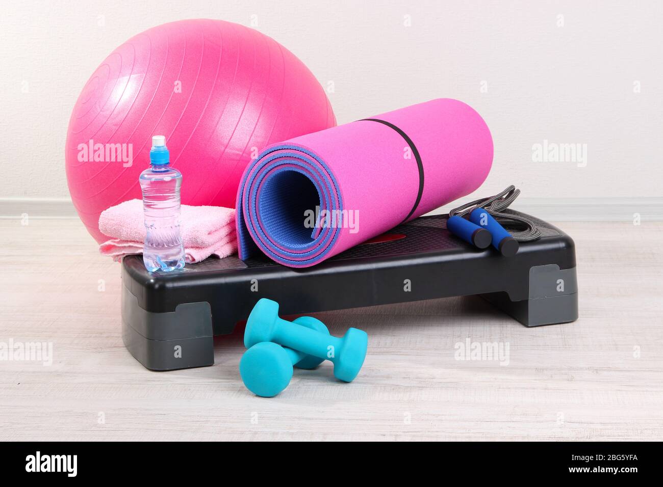Different tools for fitness in room Stock Photo - Alamy
