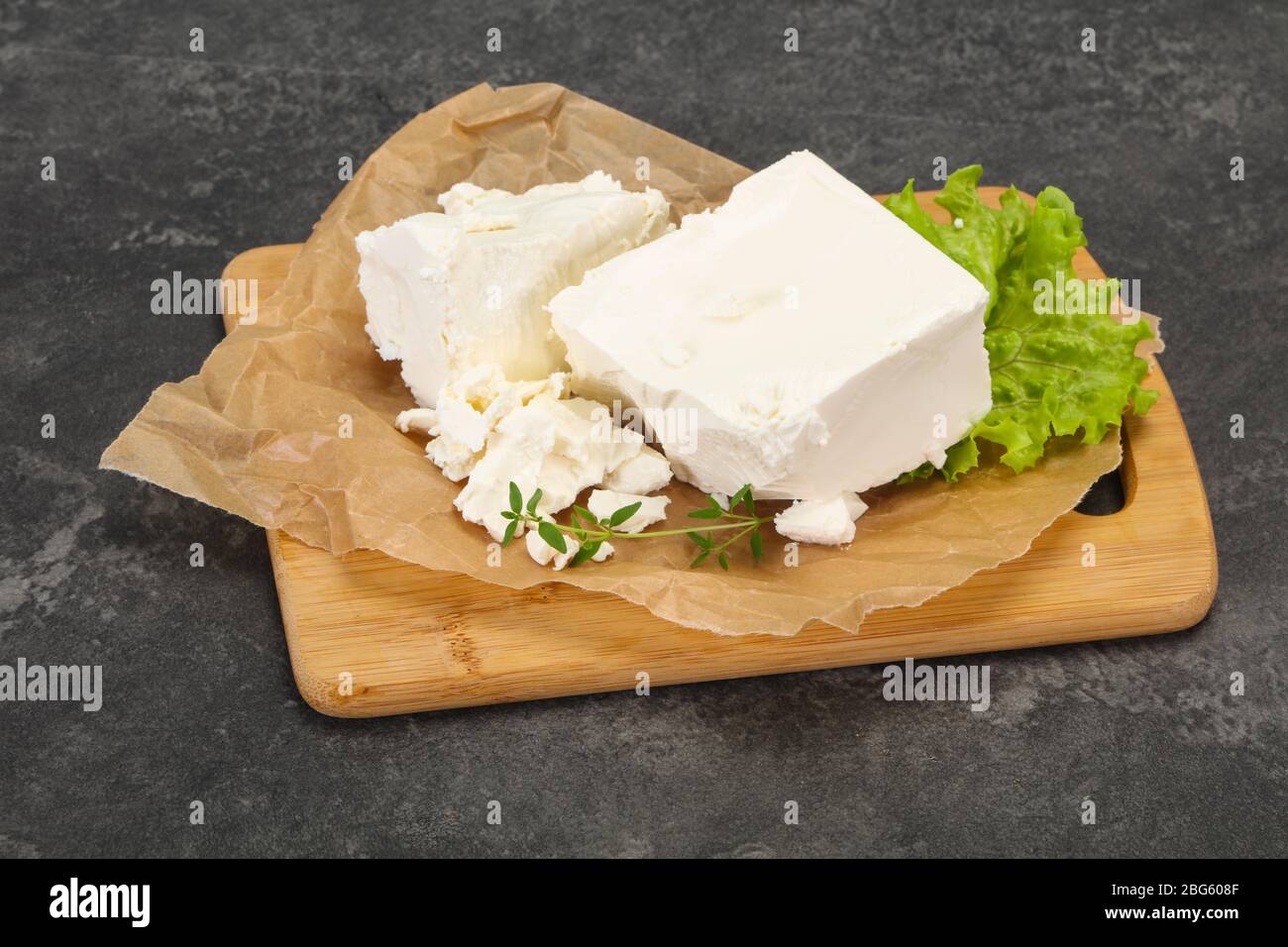 Greek traditional Feta soft cheese in the plate Stock Photo - Alamy