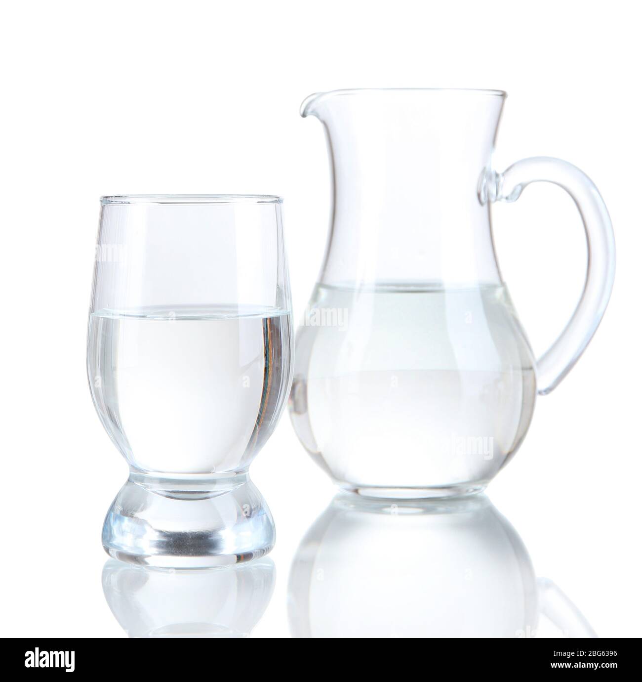 Glass pitcher of water and glass isolated on white Stock Photo - Alamy
