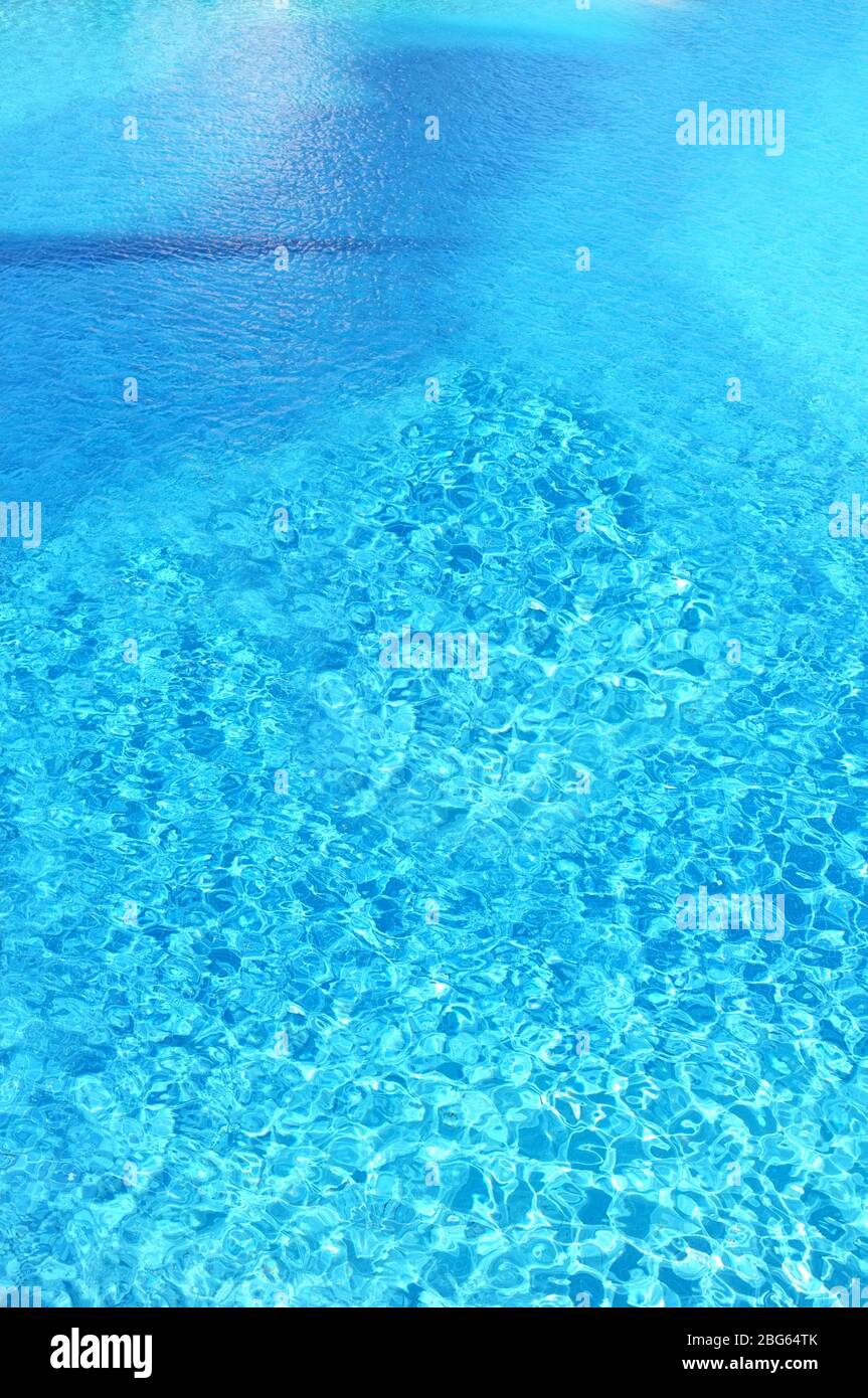 Blue water in swimming pool Stock Photo - Alamy