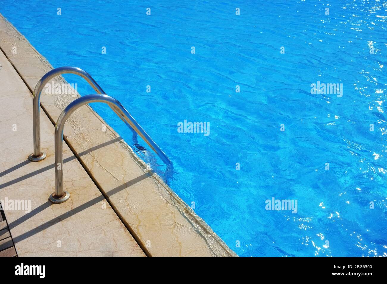 Swimming pool with stairs Stock Photo - Alamy