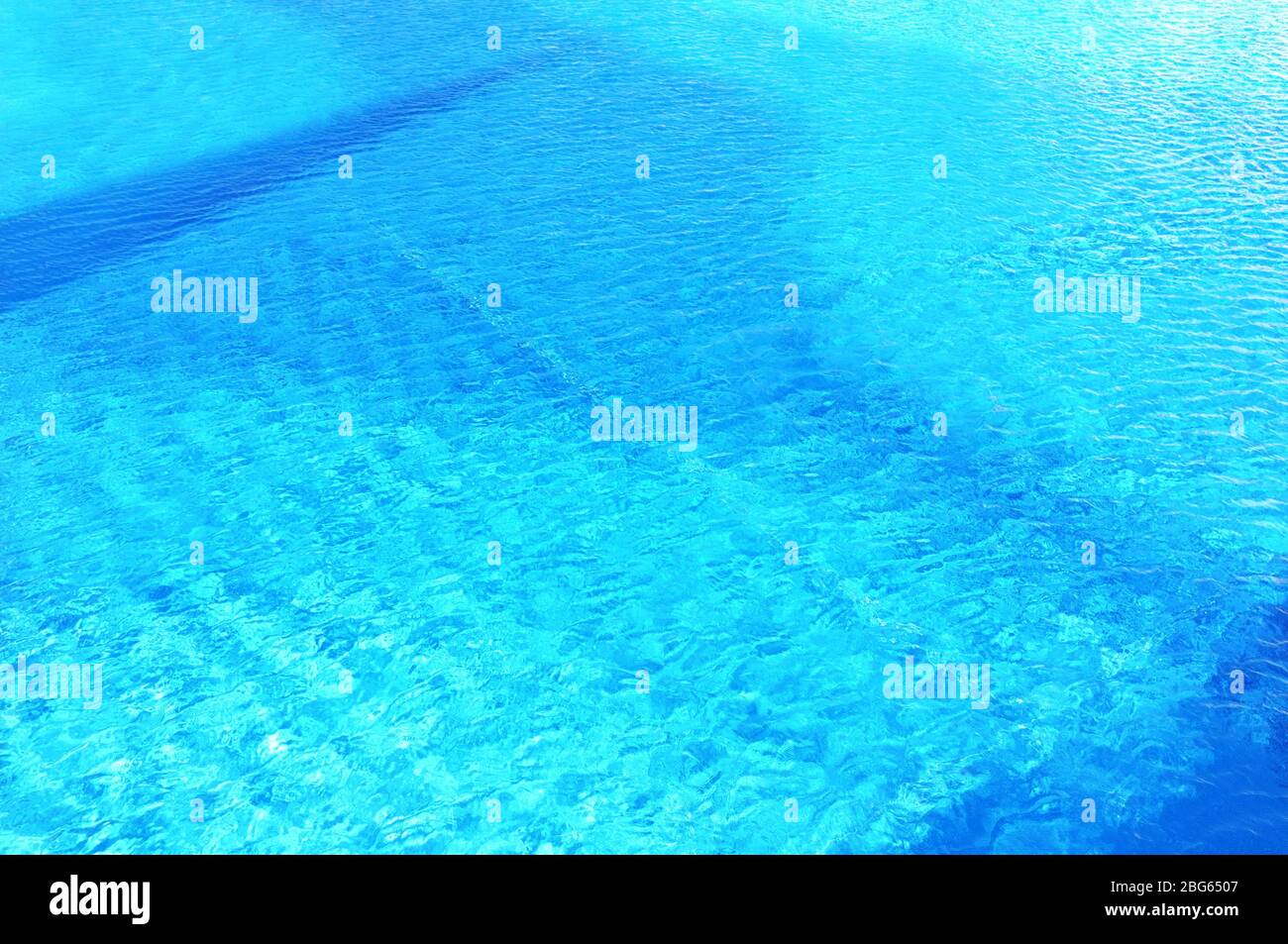 Blue water in swimming pool Stock Photo - Alamy