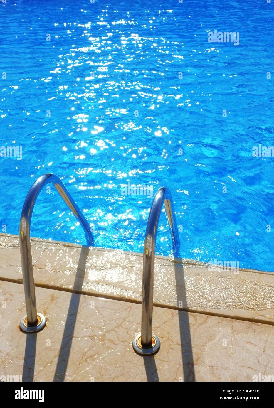 Swimming pool with stairs Stock Photo - Alamy