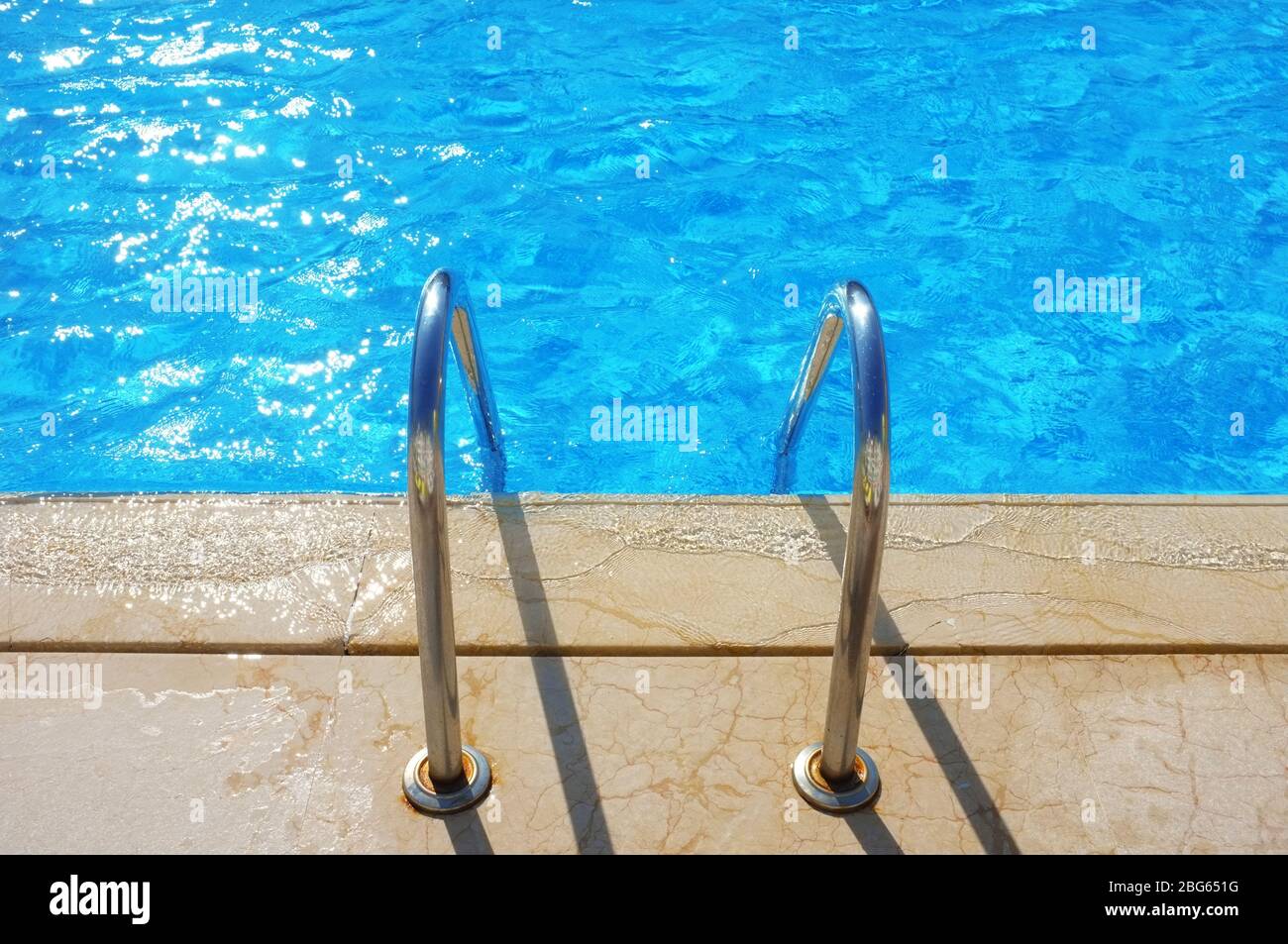 Swimming pool with stairs Stock Photo - Alamy