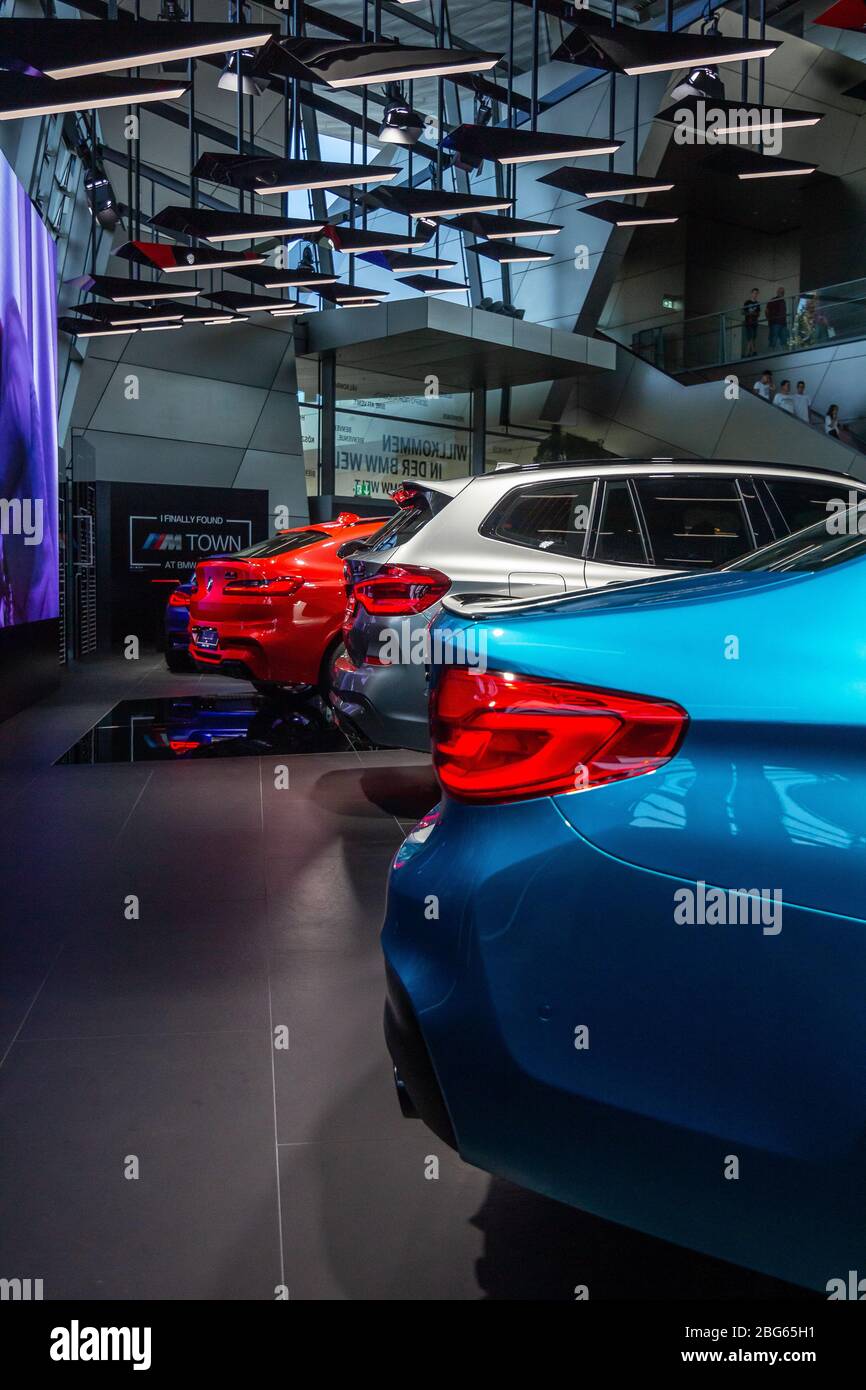 Rear lights of blue BMW M5, grey X3M, red X4M competition , München ...