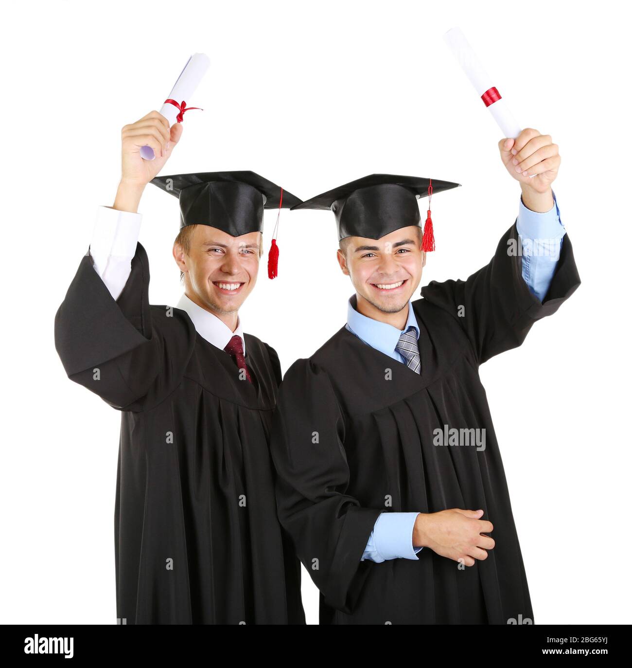Two happy graduating students isolated on white Stock Photo - Alamy
