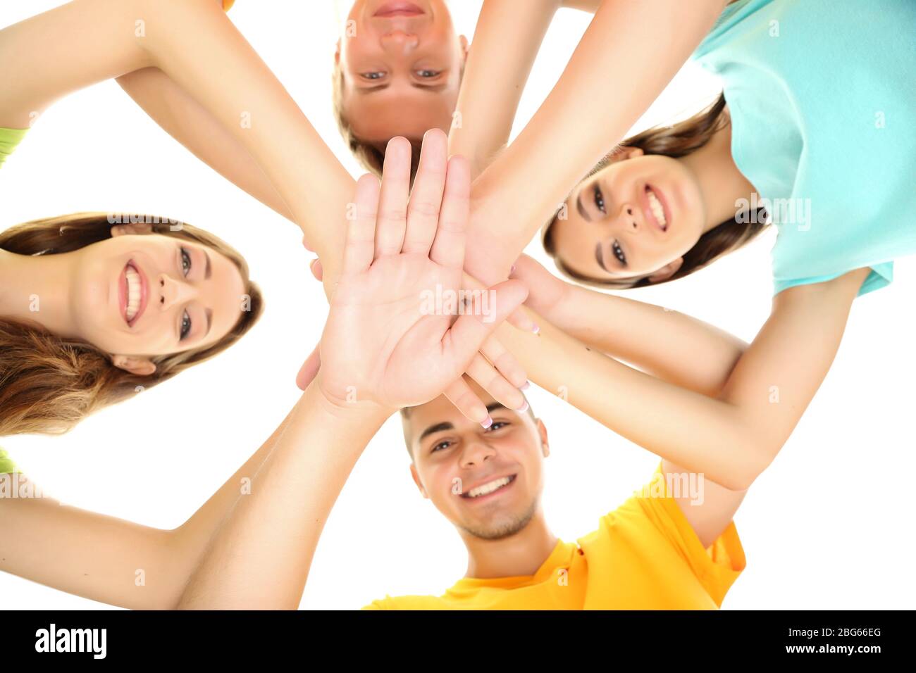 Happy group of beautiful young people, isolated on white Stock Photo ...