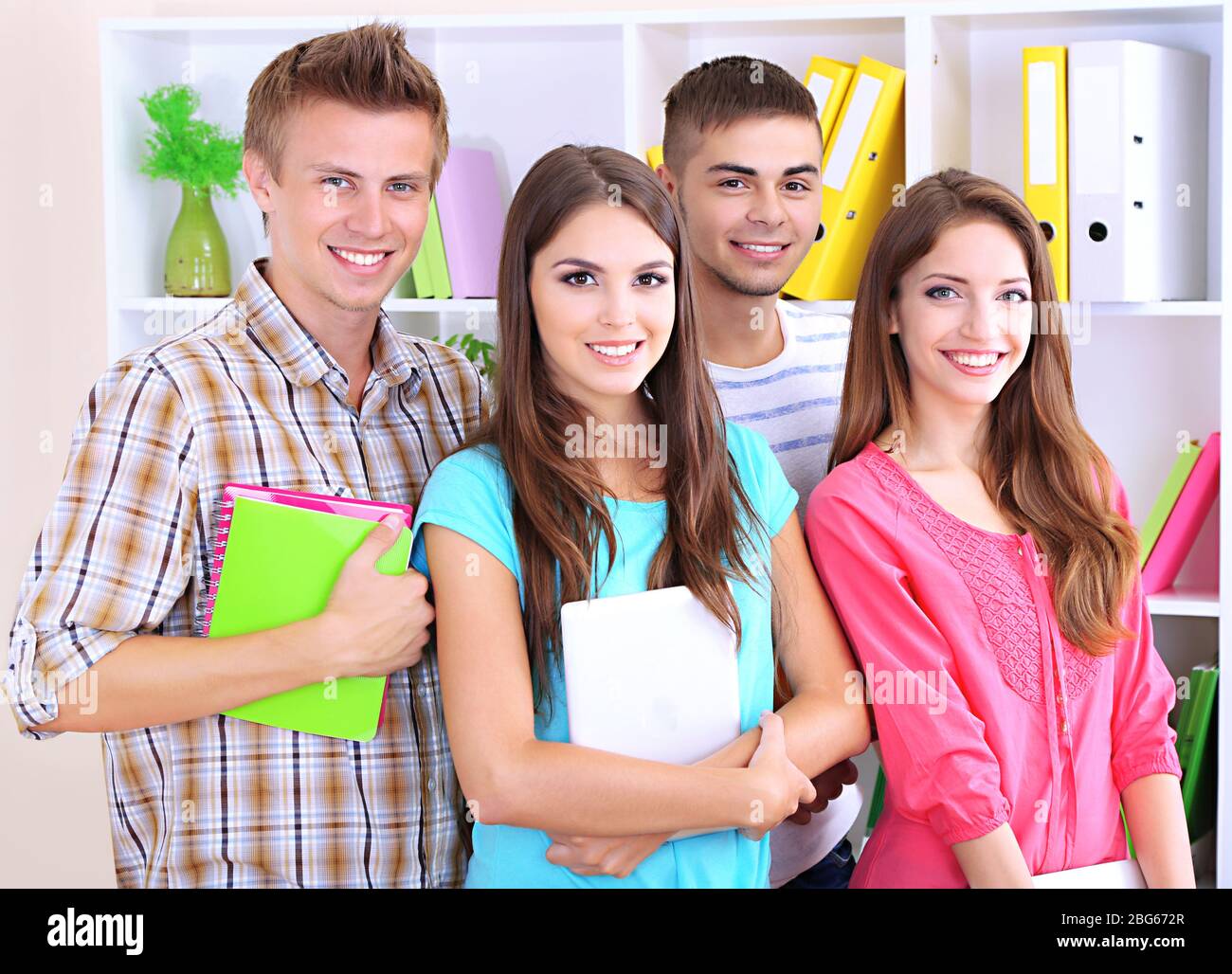 Beautiful female students notebooks isolated hi-res stock photography ...