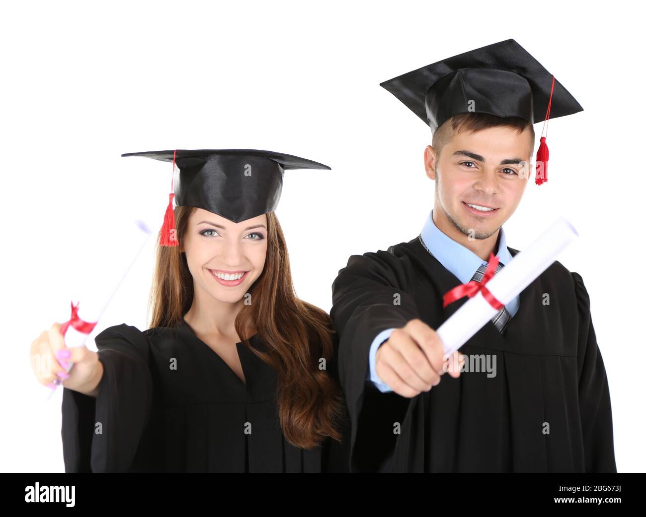 Two happy graduating students isolated on white Stock Photo - Alamy