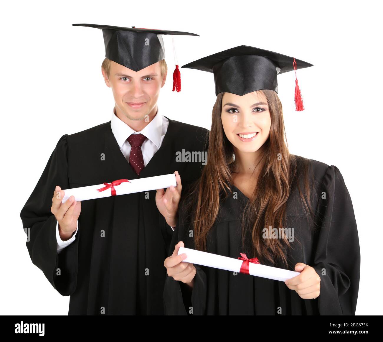 Two happy graduating students isolated on white Stock Photo - Alamy
