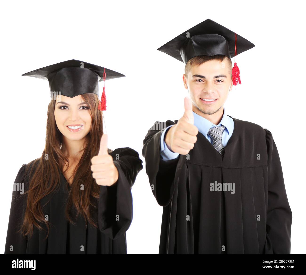 Two happy graduating students isolated on white Stock Photo - Alamy