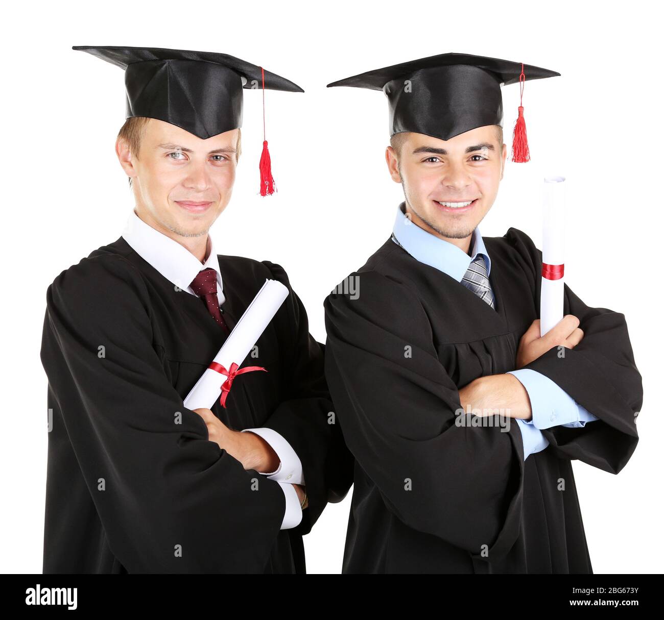 Two happy graduating students isolated on white Stock Photo - Alamy