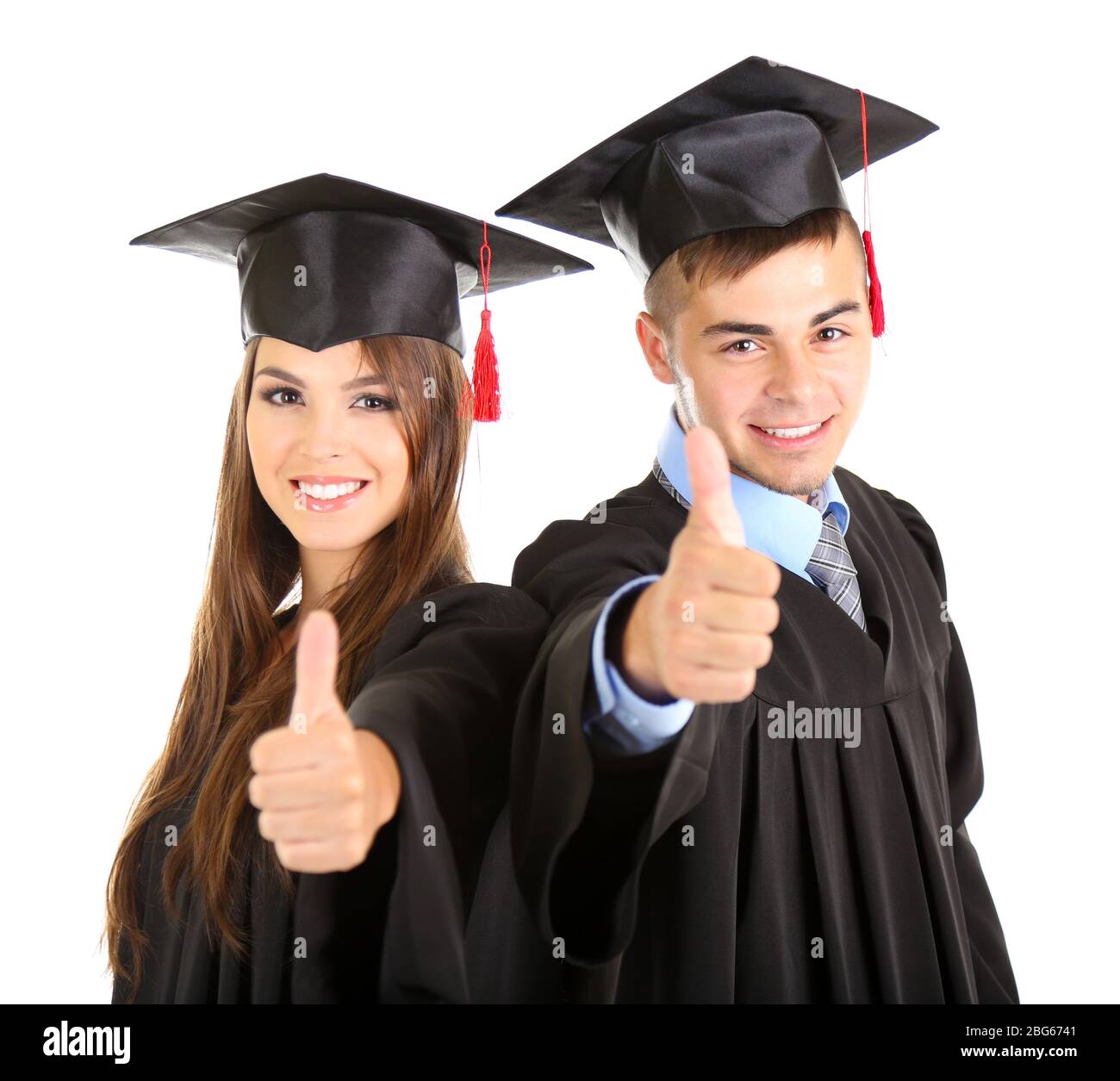Two happy graduating students isolated on white Stock Photo - Alamy