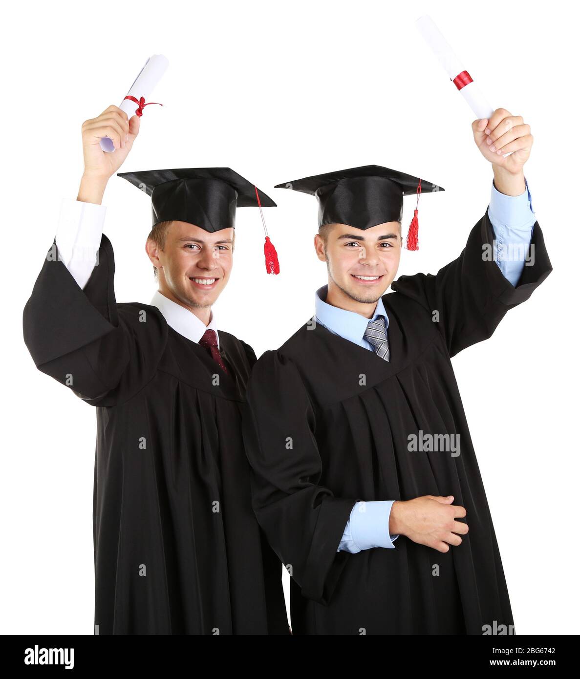 Two happy graduating students isolated on white Stock Photo - Alamy