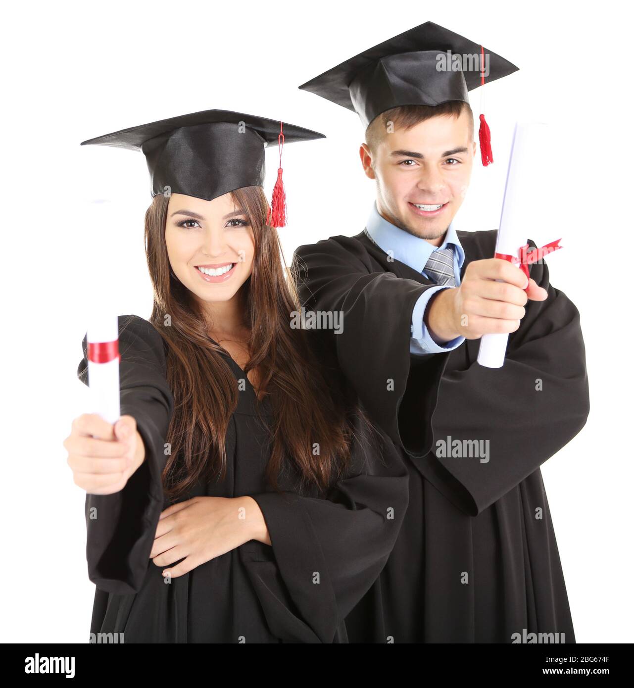Two happy graduating students isolated on white Stock Photo - Alamy